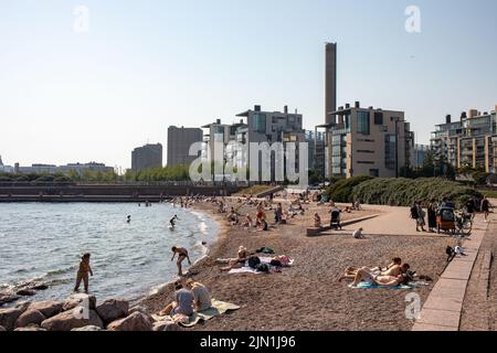 People tanning and swimming at Eiran ranta in Helsinki, Finland Stock ...