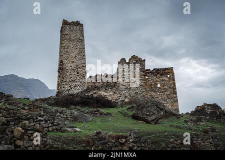 Medieval Tower Complex Egikal against cloudy skies, Ingushetia Stock ...