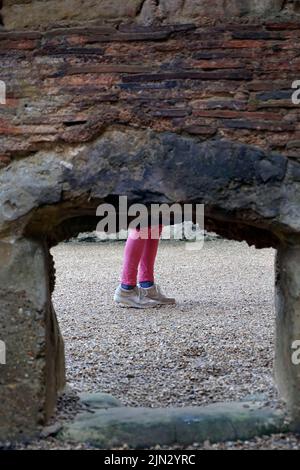 Feet Through Hole Stock Photo - Alamy