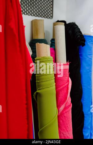 tubes of fabrics with which to design garments Stock Photo - Alamy