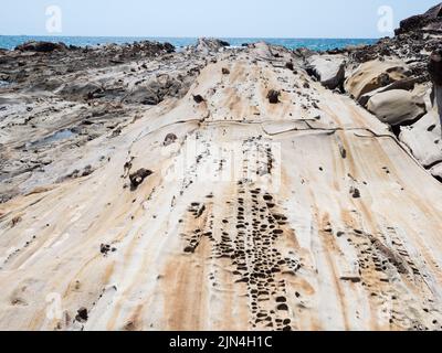 Sandstone rock formations at Tatsukushi coast - a natural scenic ...