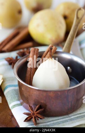 Poached Pear prep - shallow dof Stock Photo - Alamy
