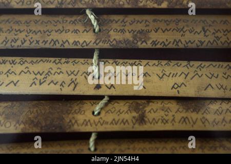 Ancient scripts written on bamboo—originated from Lampung (Sumatra)—is ...