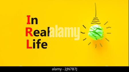 IRL in real life symbol. Concept words IRL in real life on white paper ...