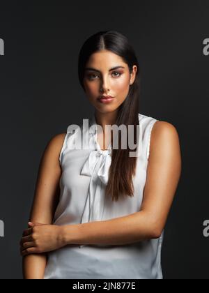 Modern modesty. Cropped portrait of an attractive young woman posing ...