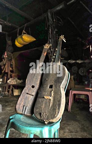 Traditional guitar-like stringed instruments in Fatumnasi village ...