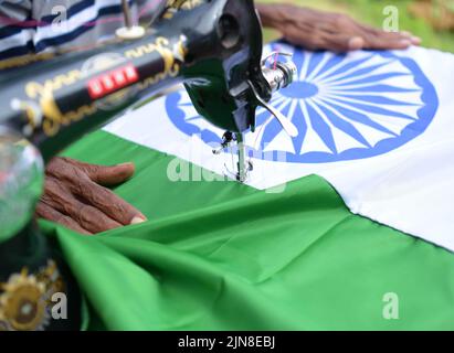 Workers prepare Indian national flags at a workshop ahead of India’s ...