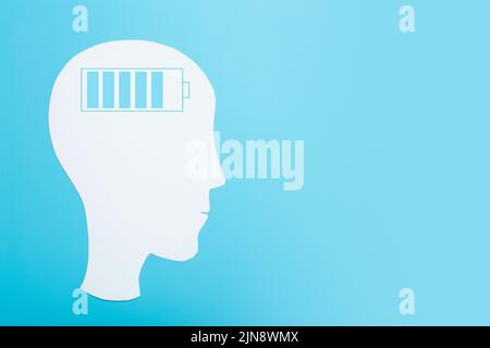 Brain charge concept. Brain energy charging indicator on paper-cut head ...