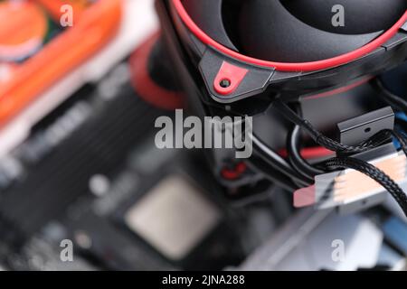 Mounting computer cooler fan on computer system unit Stock Photo - Alamy