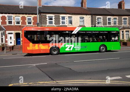 Cardiff single decker electric bus at a bus stop on Westgate Street ...