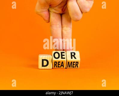 Doer or dreamer symbol. Concept words Doer or dreamer on wooden cubes ...