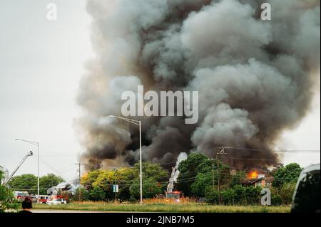 The tragic view of the Pheasant run resort huge gray fire smoke in St ...