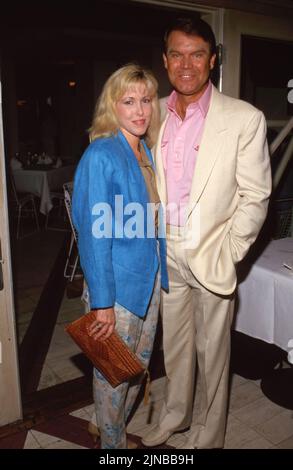 Glen Campbell and Kimberly Woolen at Spago's Restaurant in West ...
