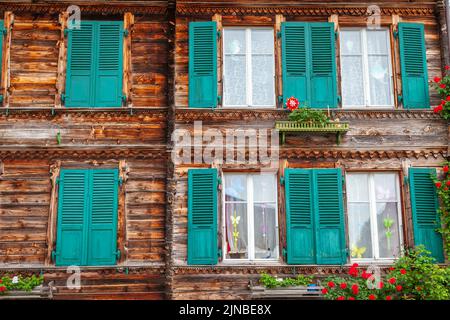 Wooden rustic swiss chalet facade in Interlaken, Switzerland Stock Photo - Alamy