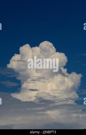 Towering cumulus clouds form on the horizon near Santa Fe, New Mexico ...