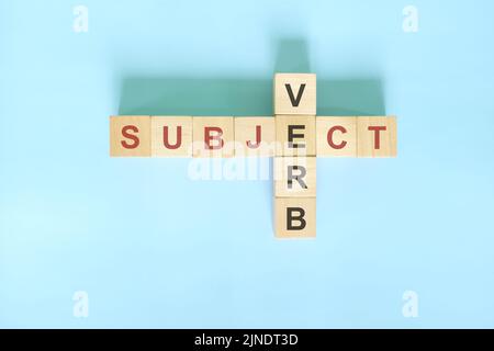 Verb concept in English grammar and learning class lesson. Wooden ...
