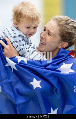 Jessica Stenson, Australia, celebrates with her son, Billy, following ...