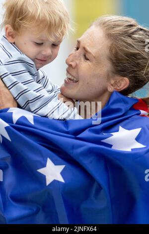 Jessica Stenson, Australia, celebrates with her son, Billy, following ...