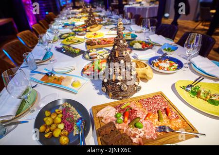 Christmas festive feast with a beautiful craft tree in the center Stock ...