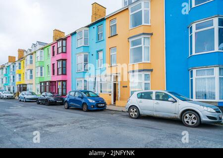 ABERYSTWYCH, WALES, UK - JULY 06, 2022: A row of colorful houses in ...