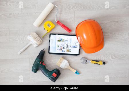 Top View of Digital Tablet and Assorted work and Carpentry Tools Stock ...