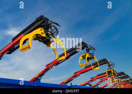 Crane manipulator with a gripper on the platform of the truck. A range ...