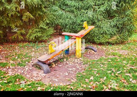 Yellow Teeter Totter Seesaw Teeterboard at Kids Playground Stock Photo ...
