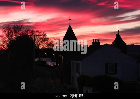 Sunset over Ringmore Towers at the Teign estuary at Shaldon, Devon ...