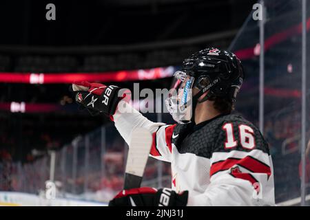 Edmonton, Canada. 11th Aug, 2022. Canada's Kent Johnson (13) and ...