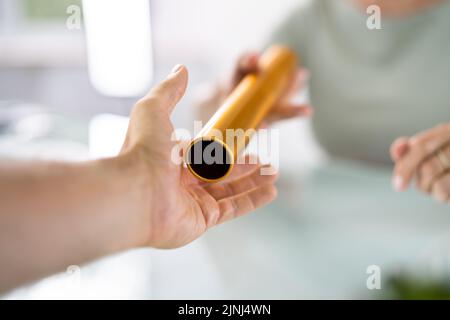 Business Woman Relay Baton Handover Stock Photo - Alamy