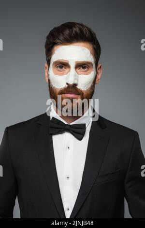 face of guy in tuxedo isolated on grey background. tuxedo guy in studio ...