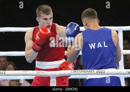 Sean LAZZERINI of Scotland (Red) v Taylor BEVAN of Wales (Blue) in the ...