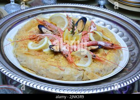Fresh baked Moroccan fish pastilla close up Stock Photo - Alamy