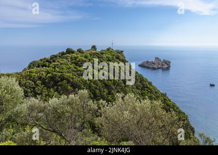 Skeludi islet seen from shore in Palaiokastritsa famous resort town on ...