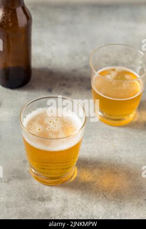 Cold Boozy Refreshing Beer in a Short Glass Stock Photo - Alamy