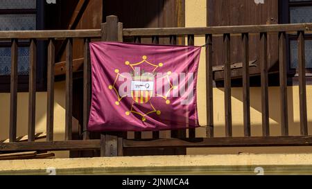 Flag of the Aran Valley, inspired by the Occitan flag, hanging from a ...