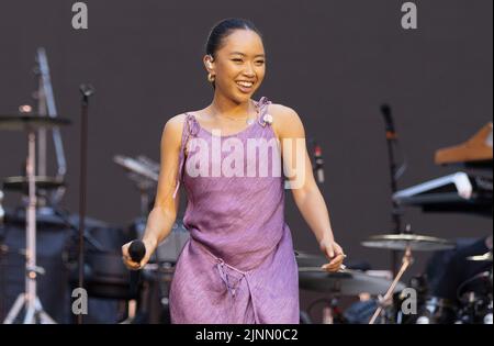 Griff performing on stage ahead of the headline act Coldplay, at ...