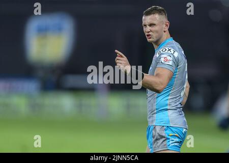 Harry Newman #3 of Leeds Rhinos breaks away to score a try during the ...