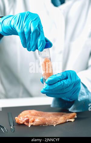 Quality control inspector taking poultry sample Stock Photo - Alamy