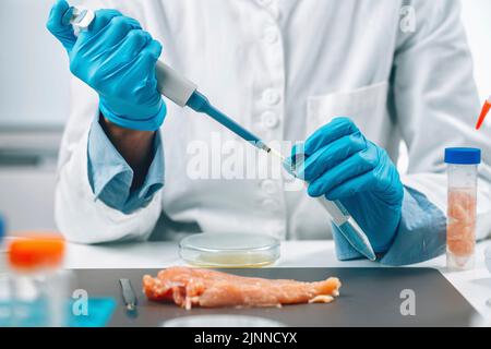 Quality control inspector testing poultry sample Stock Photo - Alamy