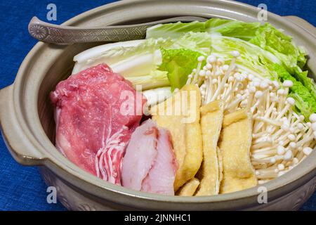 Nabemono or nabe, ingredients mixed meat and vegetables cooked in broth ...