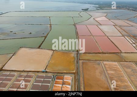 Salt extraction in Sri Lanka by evaporation in salt ponds Stock Photo ...