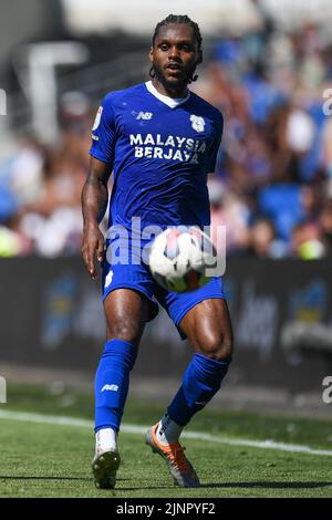 Mahlon Romeo #2 of Cardiff City Under pressure from Tim Iroegbunam #47 ...