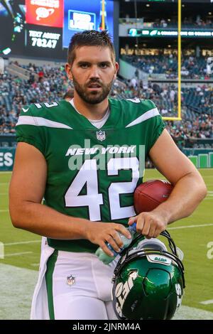 New York Jets long snapper Thomas Hennessy looks on during an NFL ...