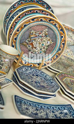 Collection of colorful Portuguese ceramic pottery, local craft products ...