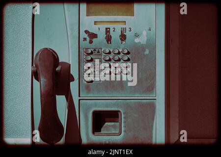 Old retro payphone standing street Stock Photo - Alamy