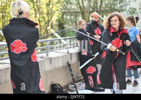 Hundreds of stands and live performances, participants dressed as Anime ...