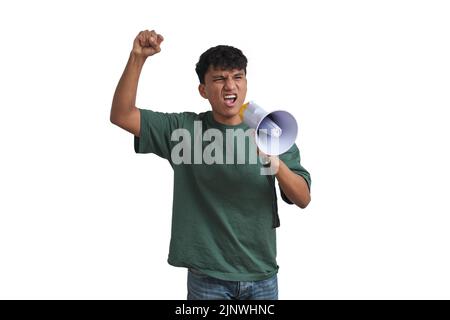 Young hispanic man shouting through megaphone smiling happy pointing ...