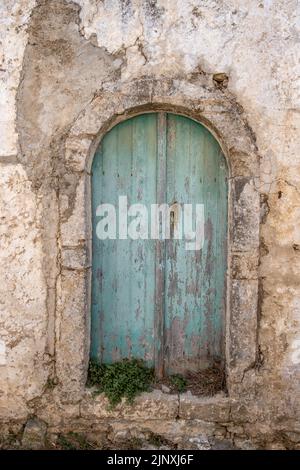 Rusty metal old blue door Stock Photo - Alamy