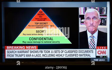 A TV screenshot of CNN coverage of the FBI search of Donald Trump's ...
